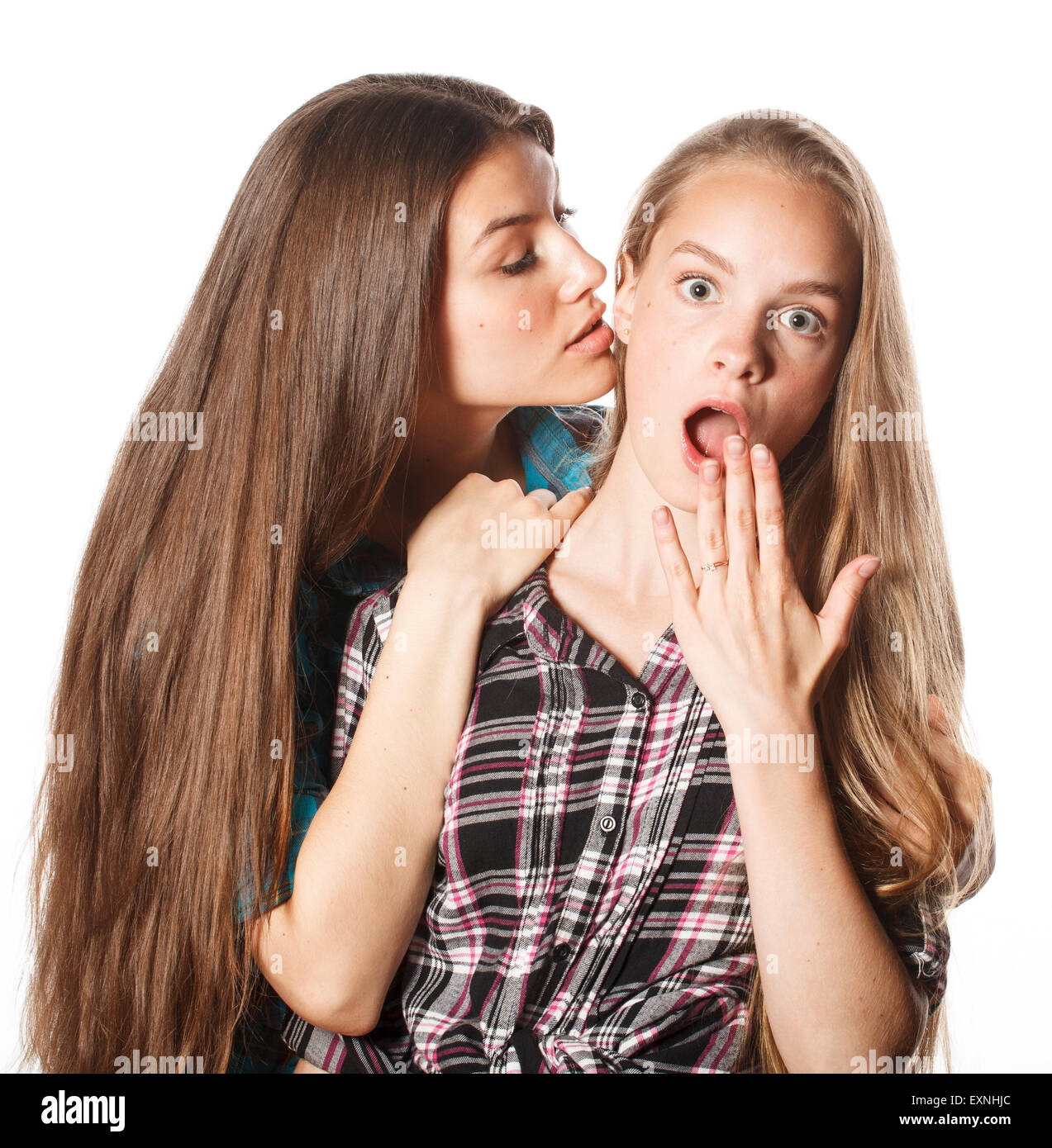 two cute teenagers having fun together isolated on white Stock Photo ...