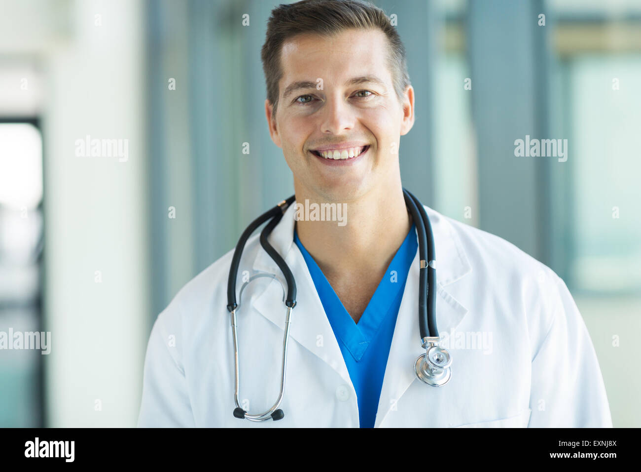 portrait of male doctor looking at the camera Stock Photo - Alamy