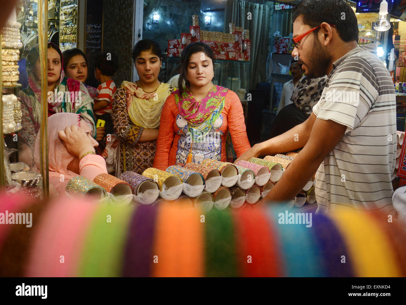 Lahore, Pakistan. 15th July, 2015. Pakistani Faithful Muslims women are ...
