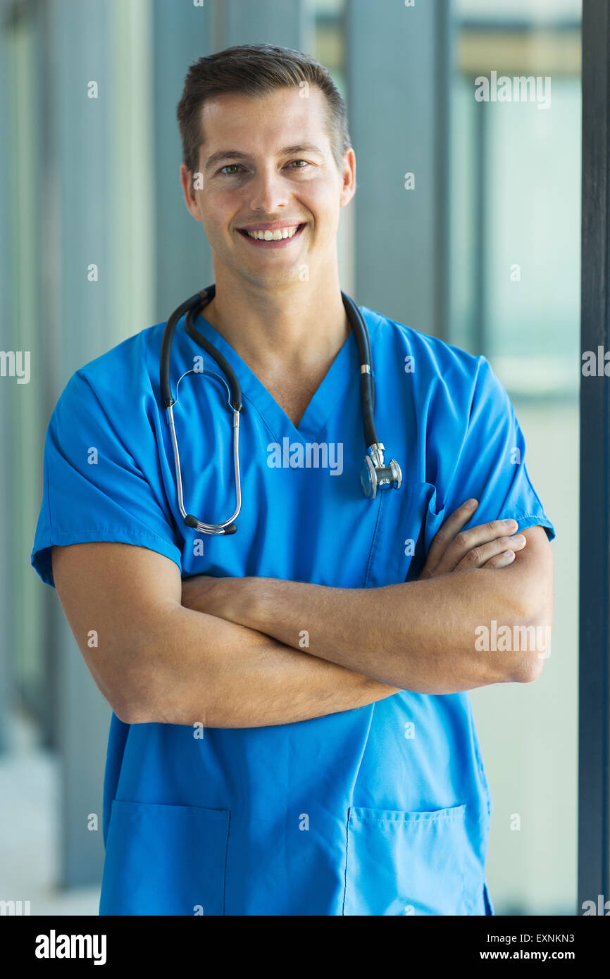 cheerful young medical intern standing in hospital Stock Photo - Alamy
