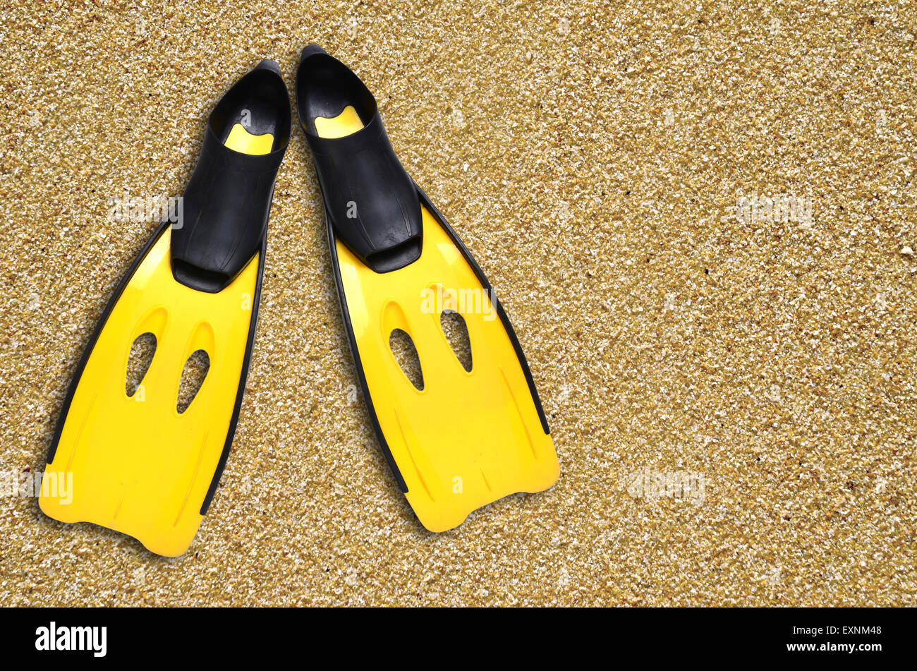 yellow fins on sand beach Stock Photo - Alamy