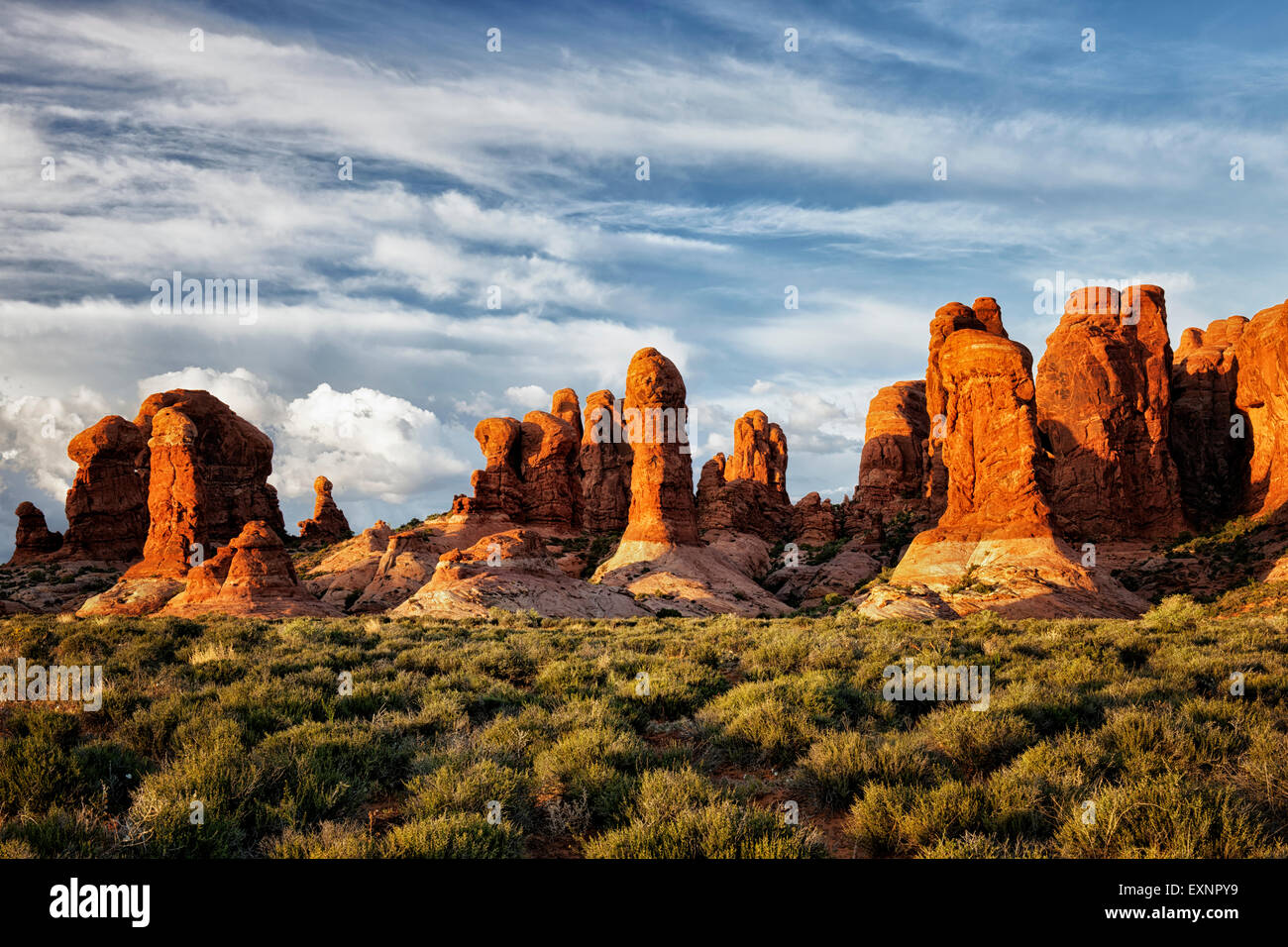 Evening clouds pass over The Garden of Eden rock formations in Utah’s ...