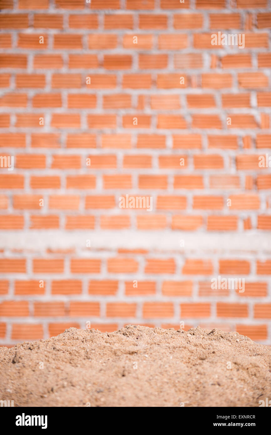sand and brick wall in background Stock Photo - Alamy