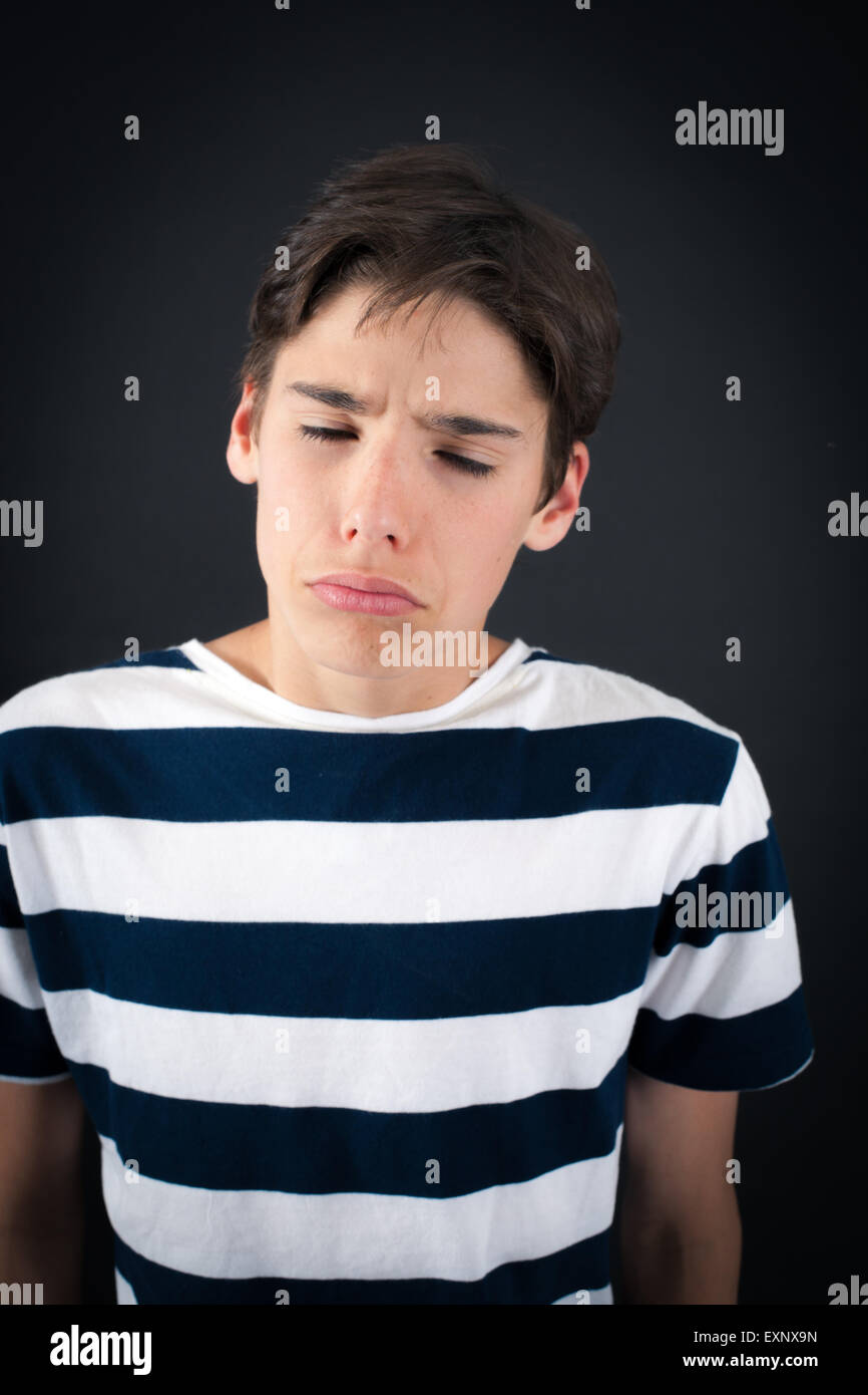 Handsome boy doing different expressions in different sets of clothes ...