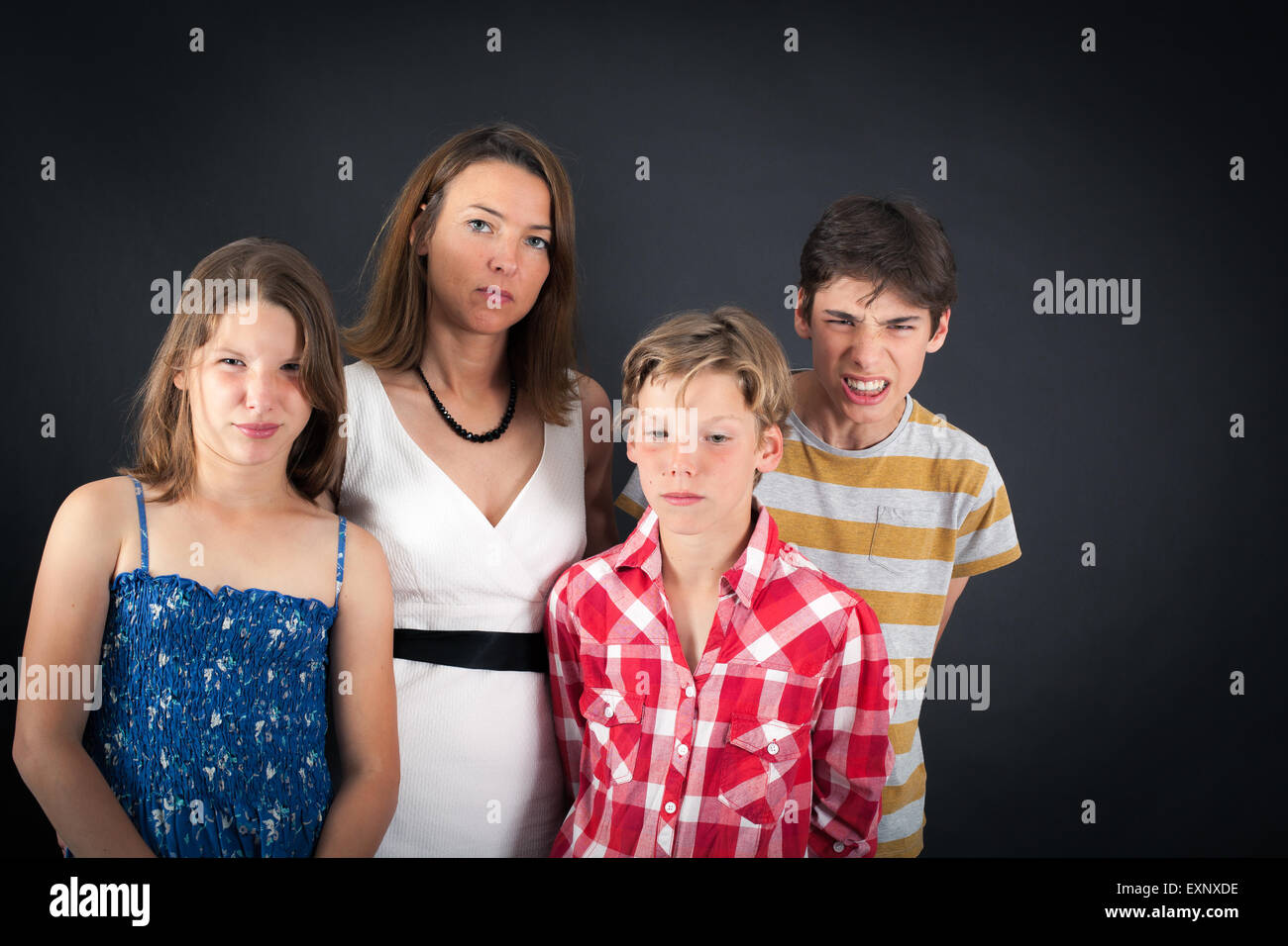 Beautiful family doing different expressions hi-res stock photography ...