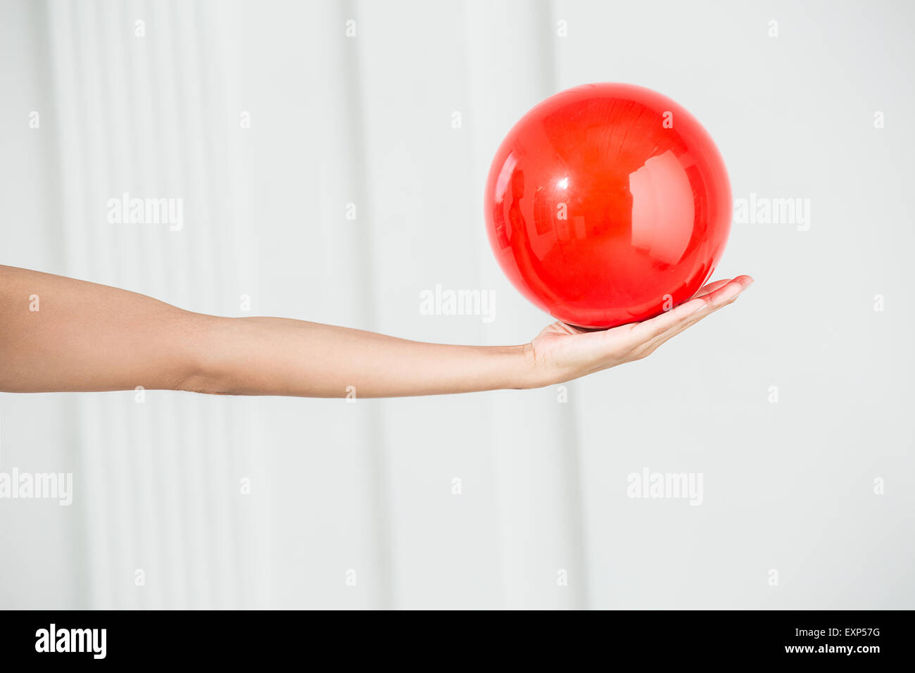Red ball for rhythmic gymnastics Stock Photo - Alamy
