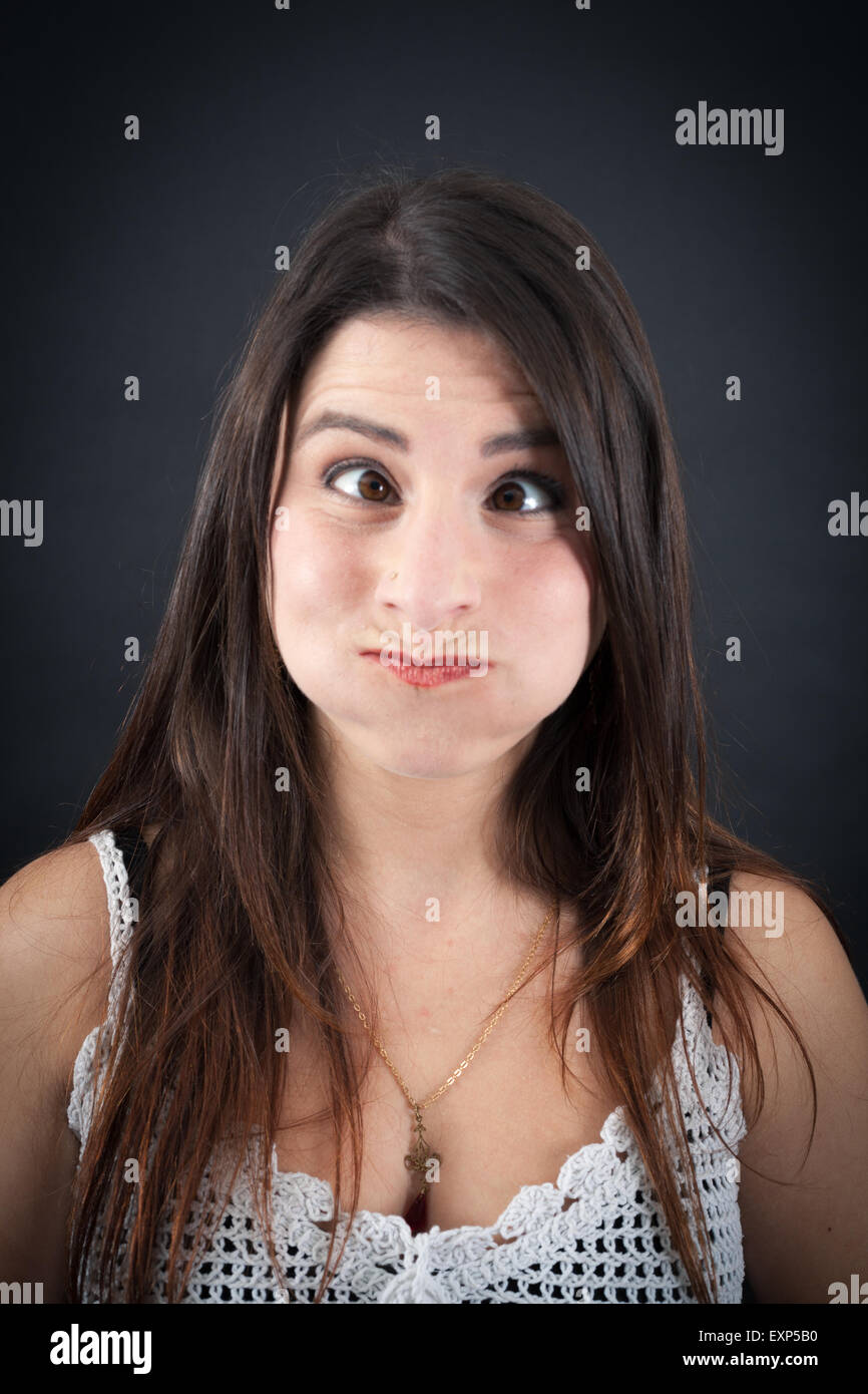Beautiful woman doing different expressions in different sets of ...