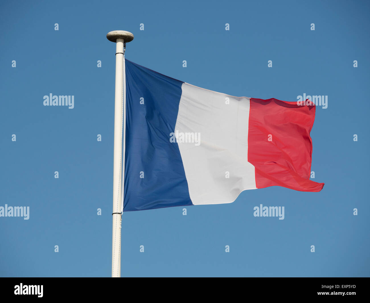 French flag floating in the wind Stock Photo - Alamy