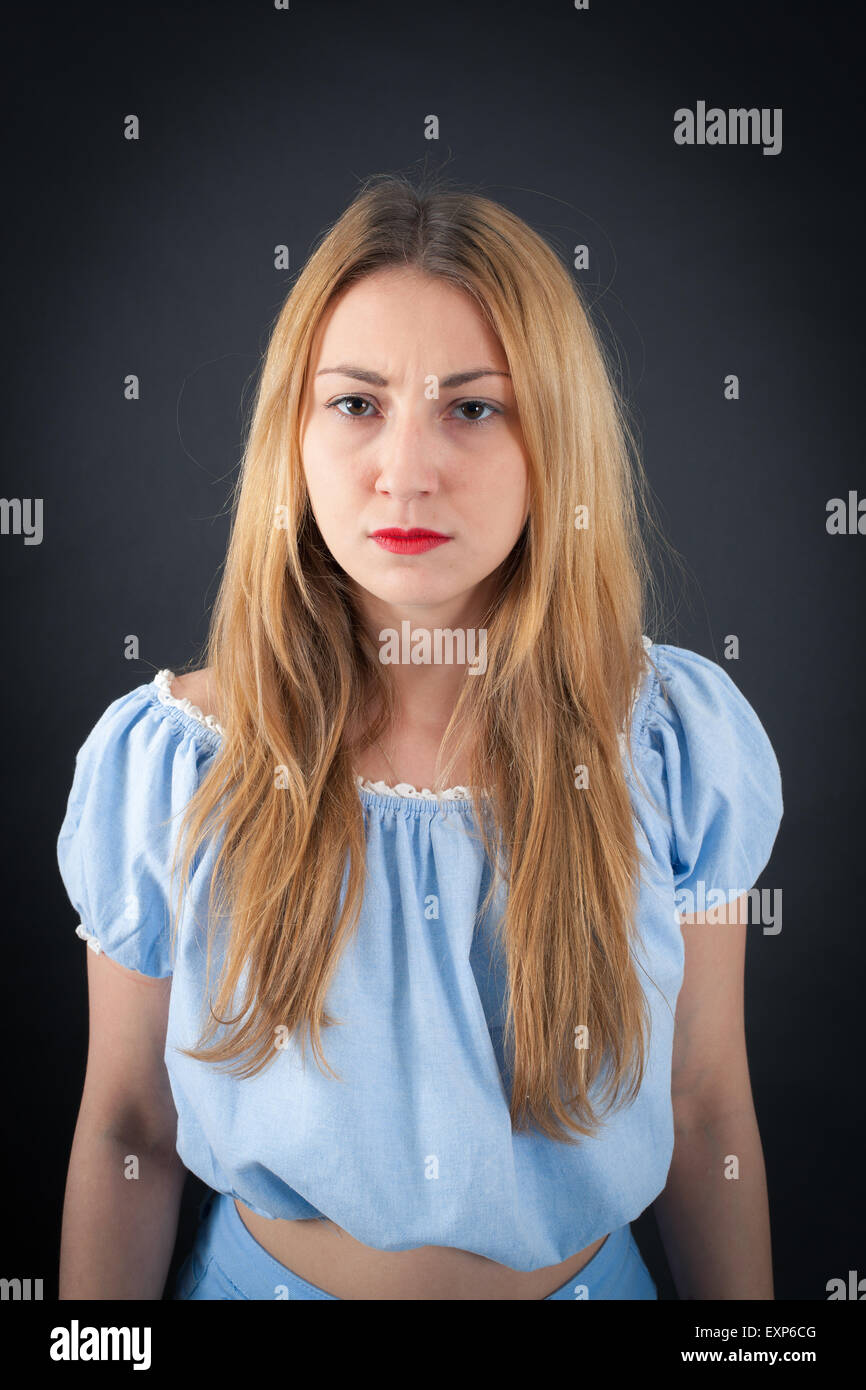Beautiful girl doing different expressions in different sets of clothes ...