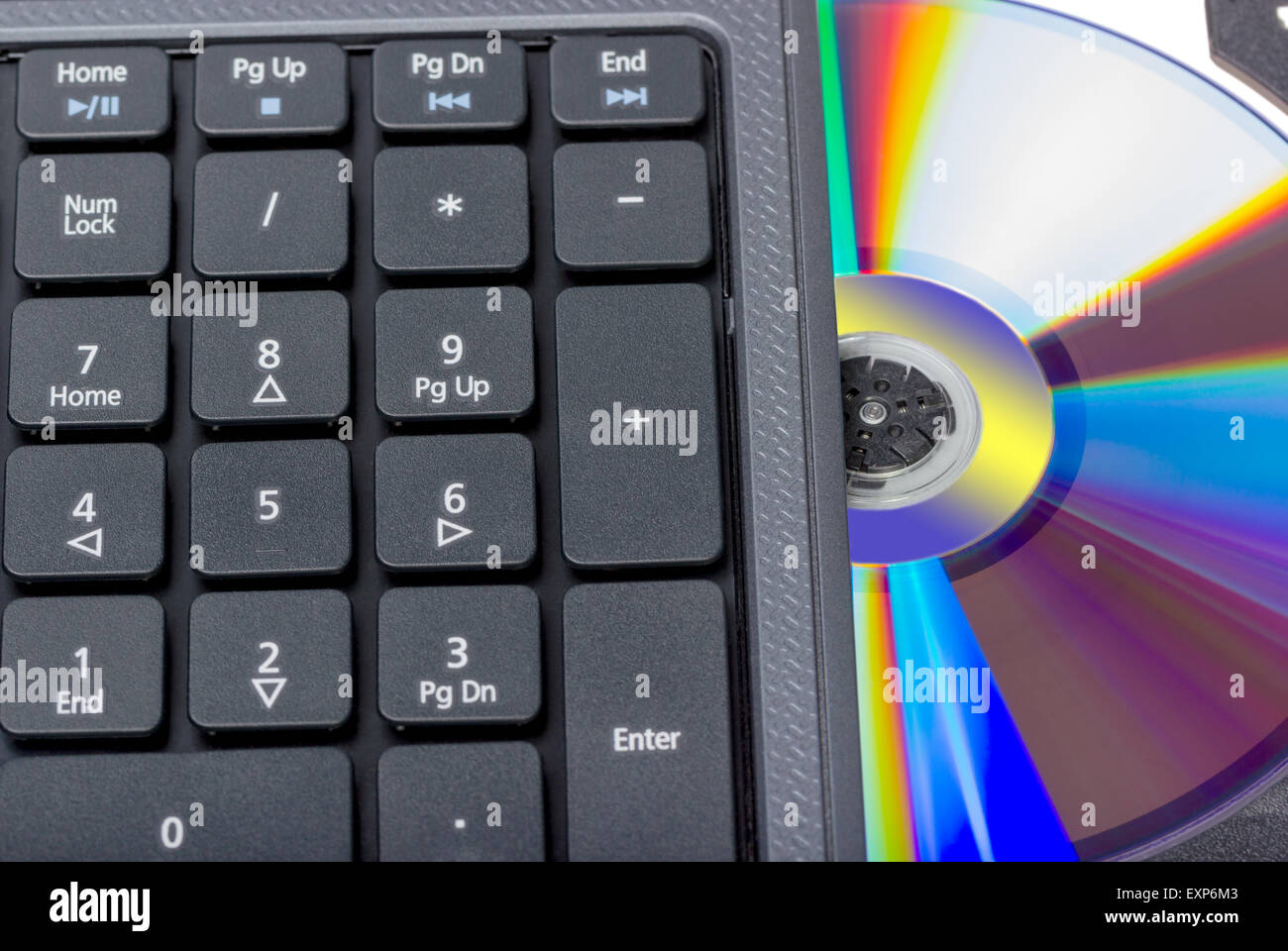 Electronic collection - Laptop with open DVD tray isolated on a white ...