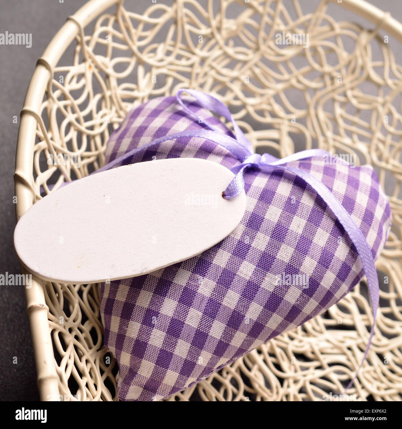 Fabric heart shape with a blank wooden label Stock Photo - Alamy