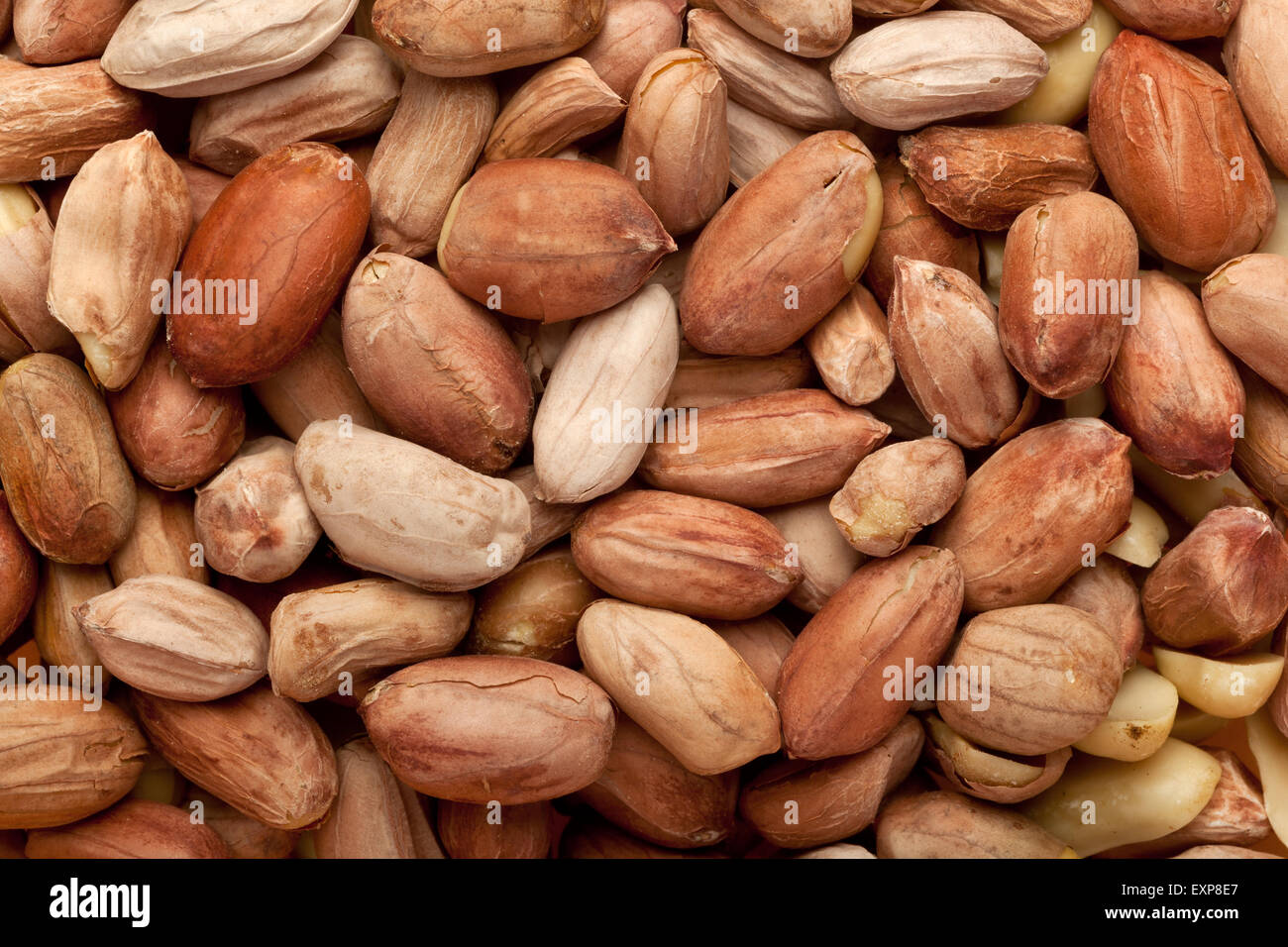 Closeup of lots of deshelled peanuts Stock Photo - Alamy
