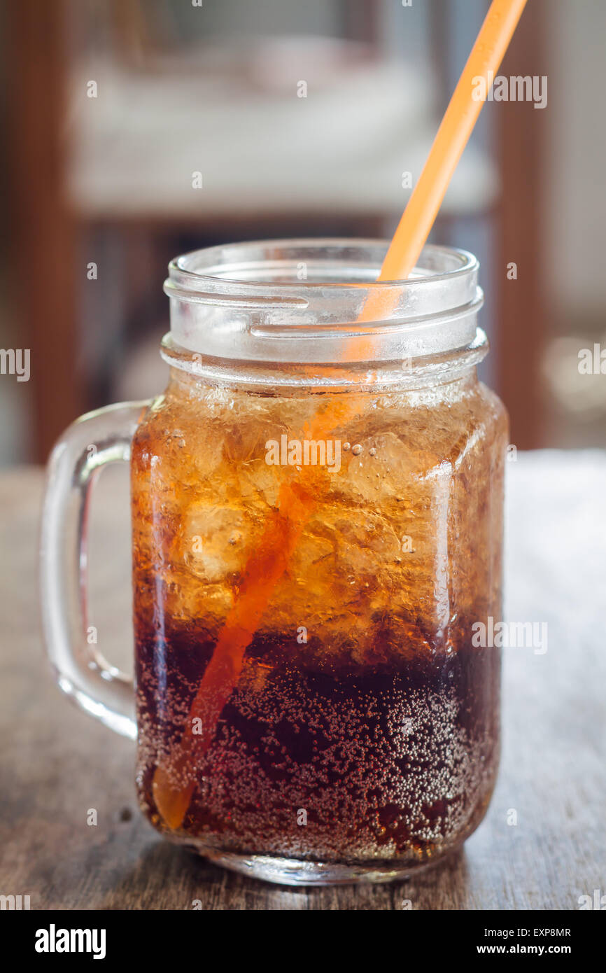 Refreshing glass cola on ice hi-res stock photography and images - Alamy