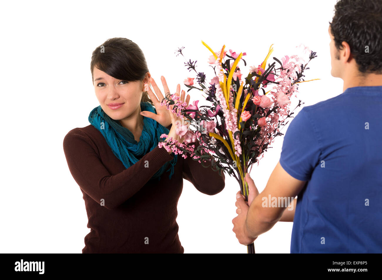 Man giving woman flowers angry hi-res stock photography and images - Alamy