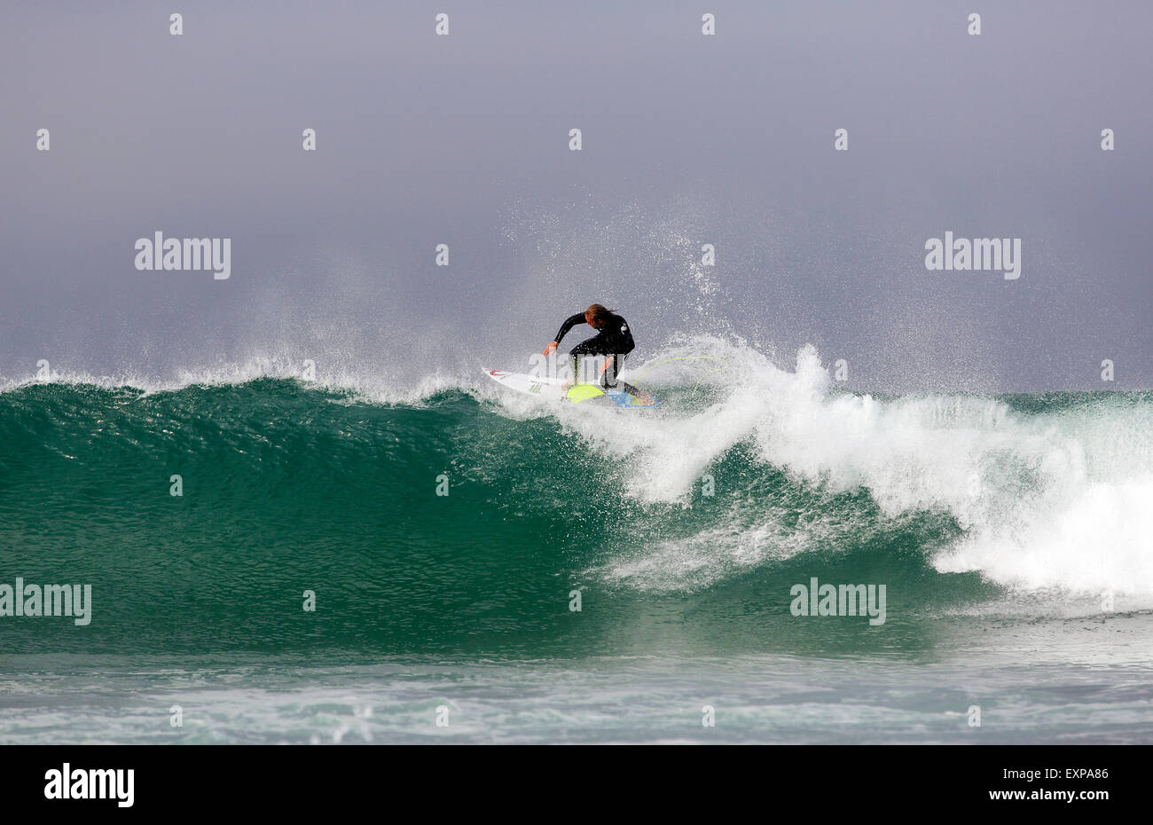 Australian professional surfer Owen Wright surfing floater over a wave ...