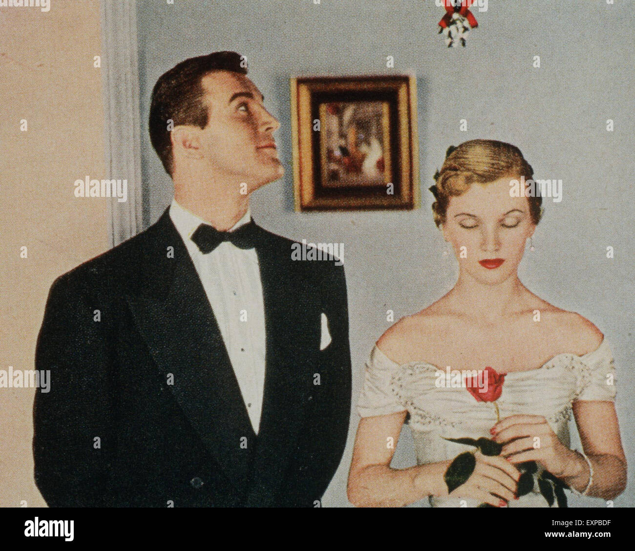 1950s USA Under the Mistletoe Magazine Plate Stock Photo - Alamy