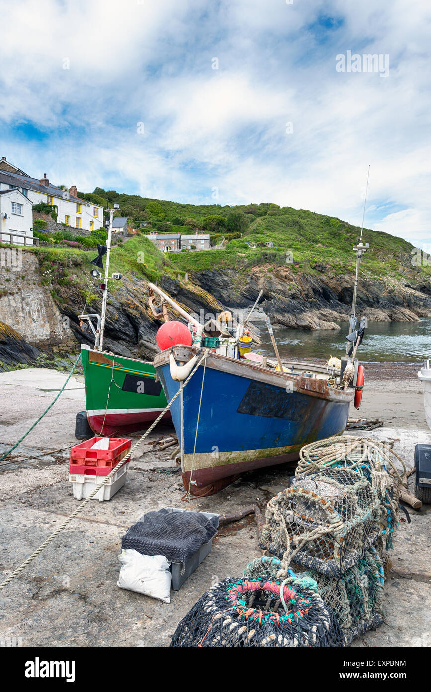 Fishing boats on the beach at Portloe a small fishing village on the ...