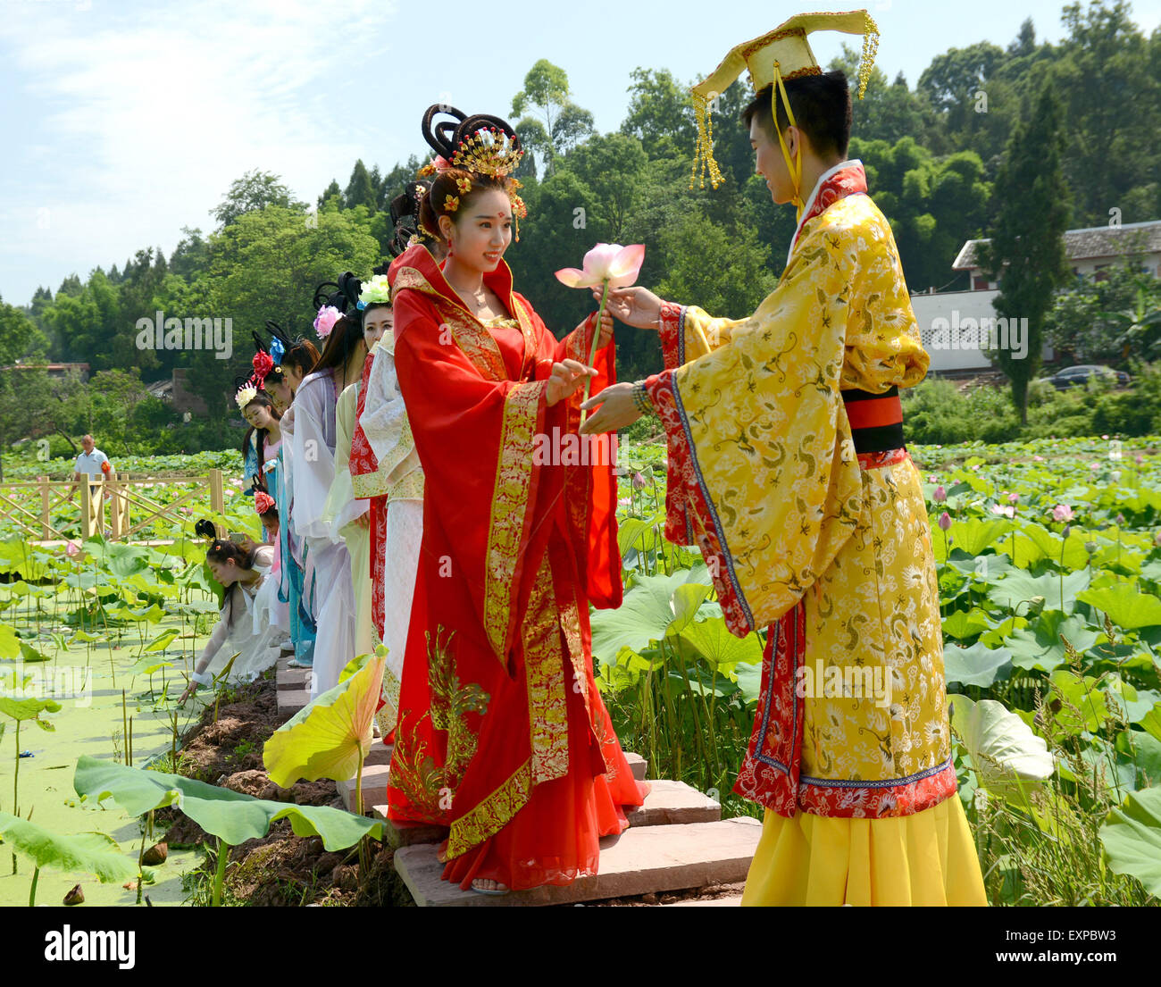 Neijiang, China's Sichuan Province. 16th July, 2015. Actors dressed as ...