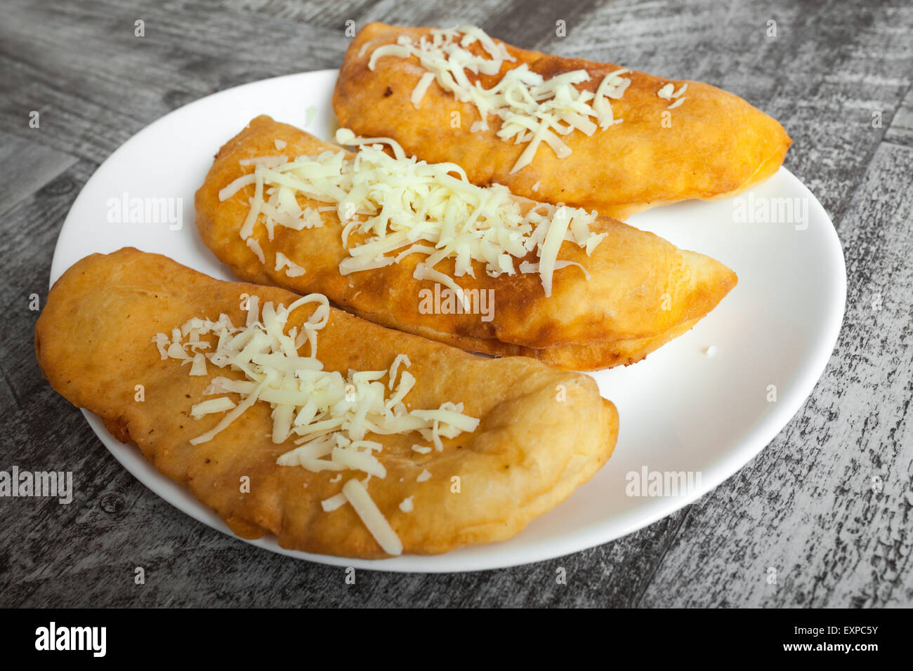 Homemade panzerotti with cheese Stock Photo - Alamy