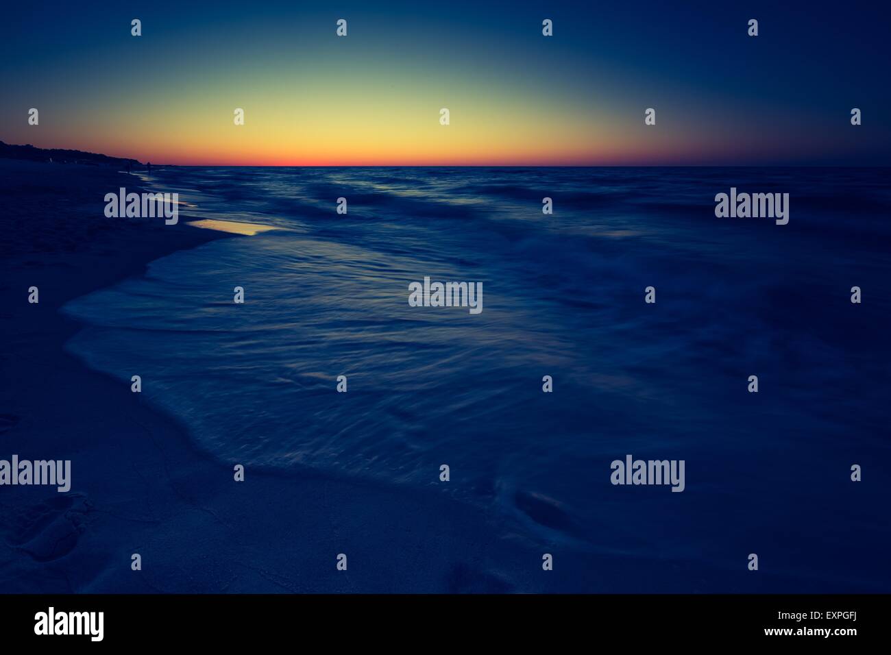 Vintage photo of beautiful after sunset landscape of Baltic Sea shore ...