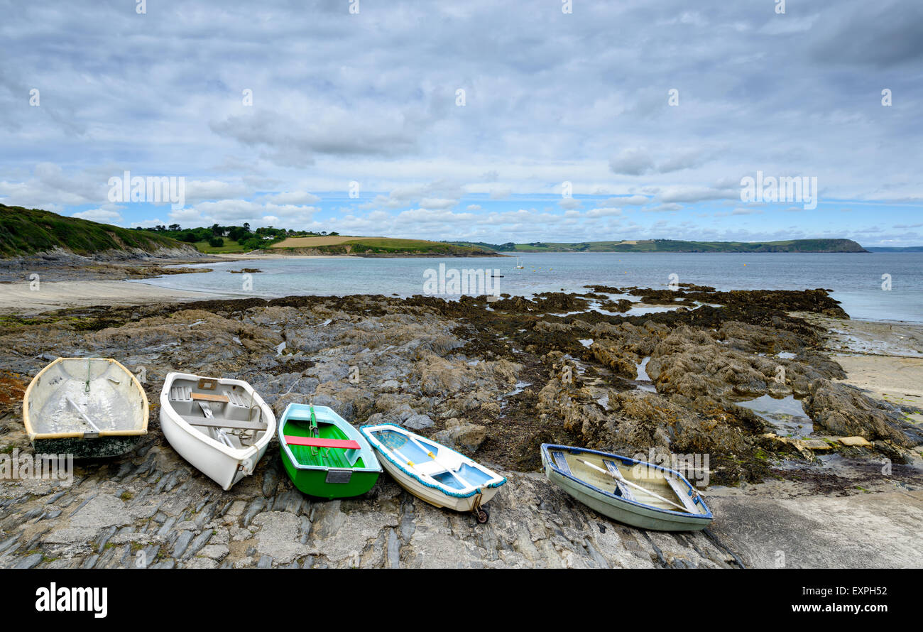 A row of rowing boats at Portscatho on the south coast of Cornwall ...