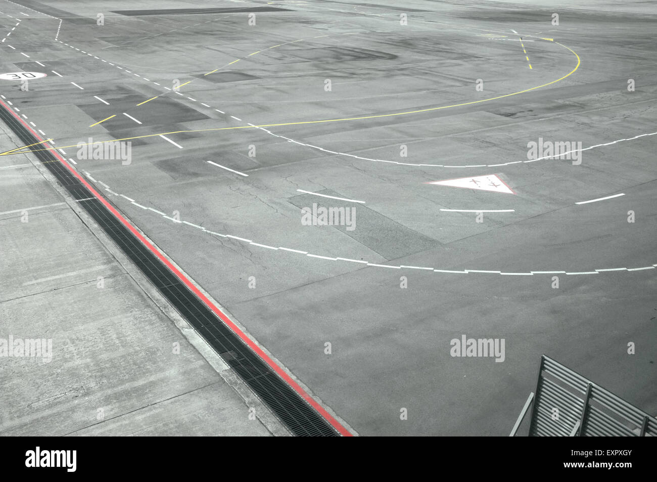 View of airport runway from window of airplane Stock Photo - Alamy