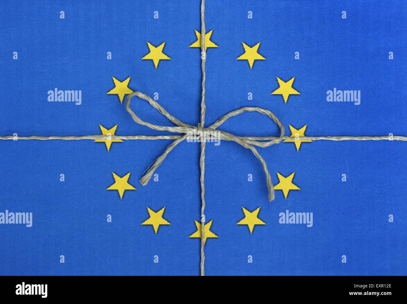 ILLUSTRATION - The European flag is binded up with a parcel string in ...