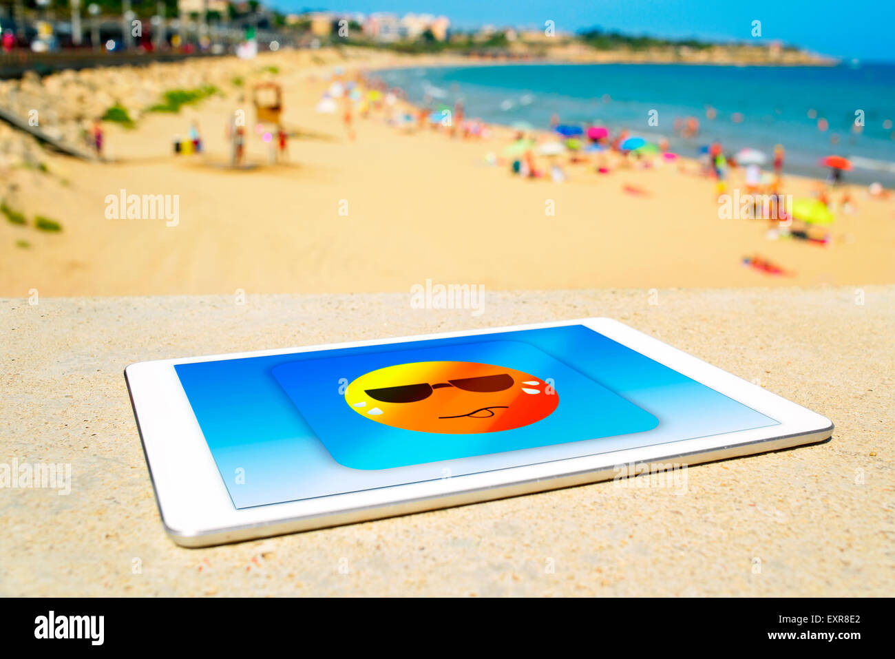 a tablet computer with an icon of a sun wearing sunglasses and sweating ...