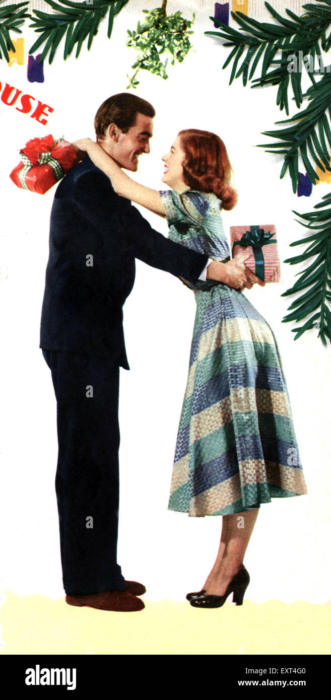 1950s UK Kissing under mistletoe Magazine Plate Stock Photo - Alamy
