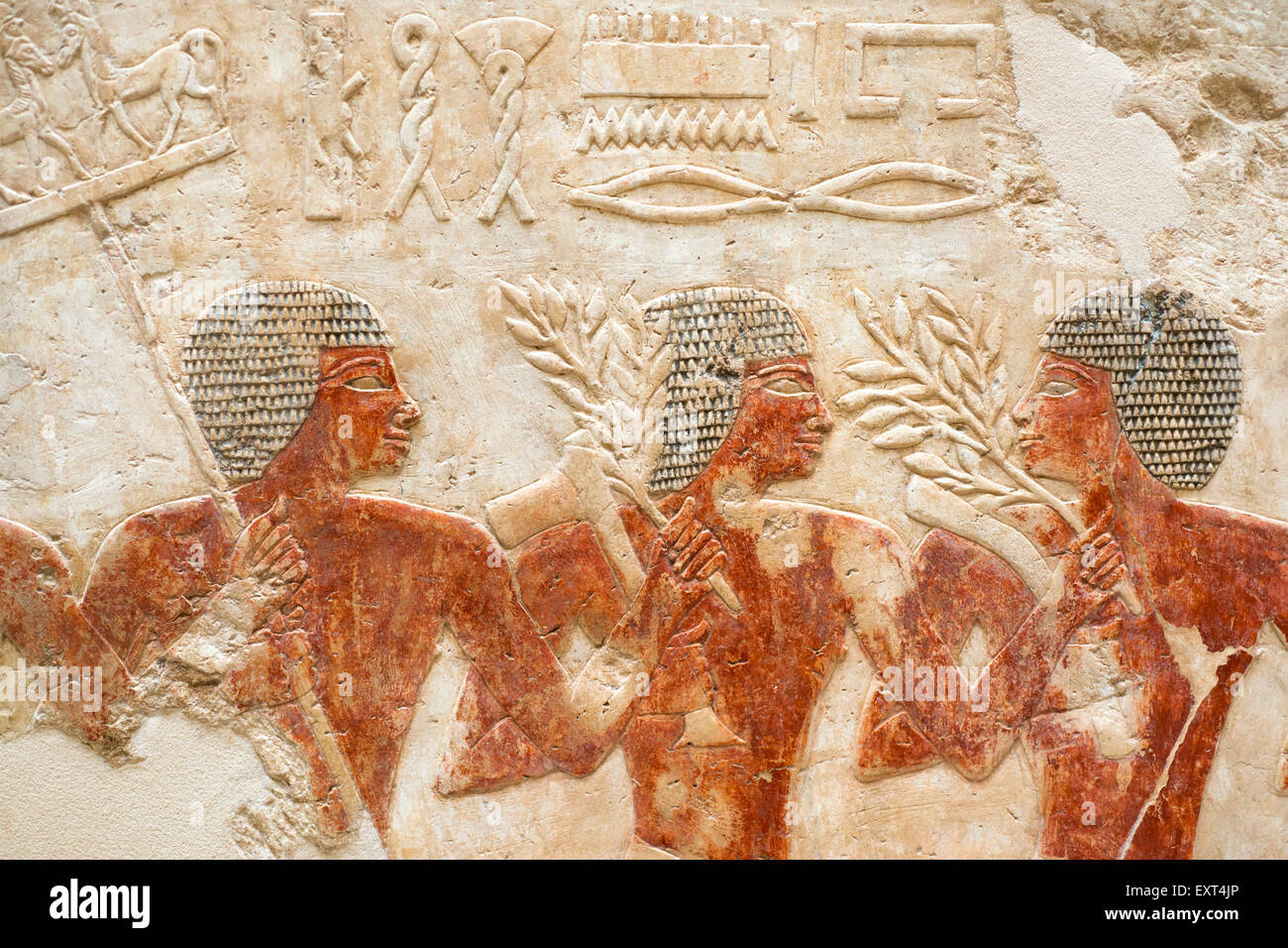 ancient Egypt stone relief with three human figures Stock Photo - Alamy