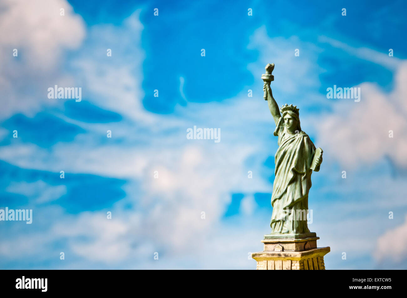 toy plastic miniature of Liberty statue and sky Stock Photo - Alamy