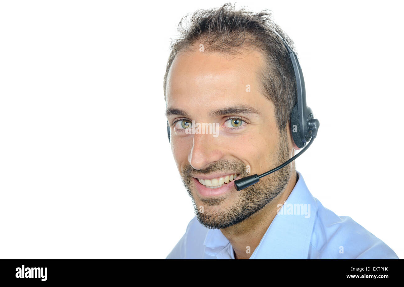 Handsome customer service operator wearing a headset on white ...