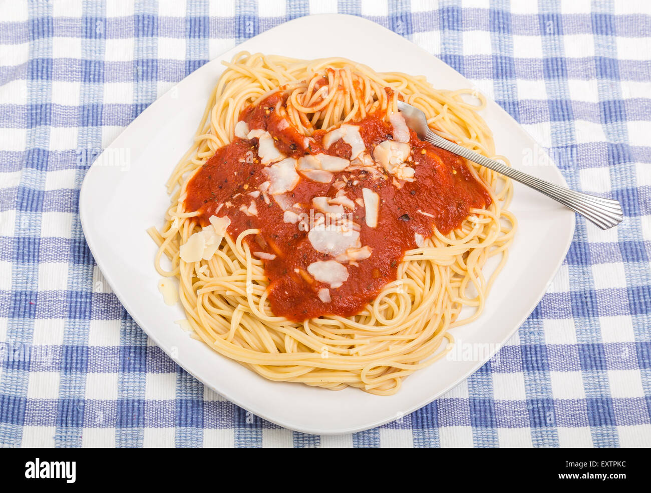 A square plate of spaghetti with tomato sauce and parmesan cheese Stock ...