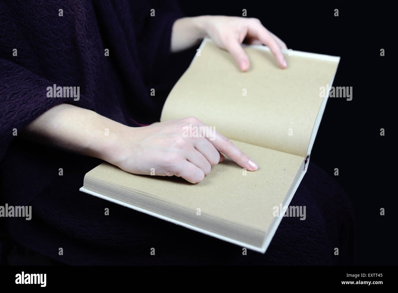 Girl reading open book hi-res stock photography and images - Alamy