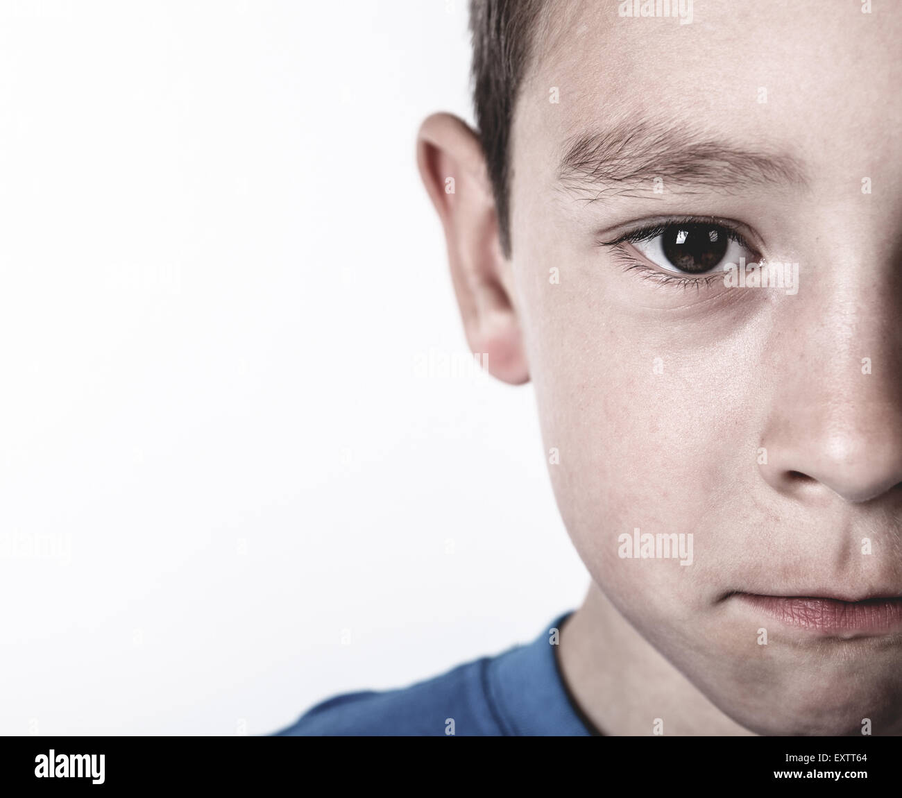 Photo of adorable young happy boy looking at camera Stock Photo - Alamy