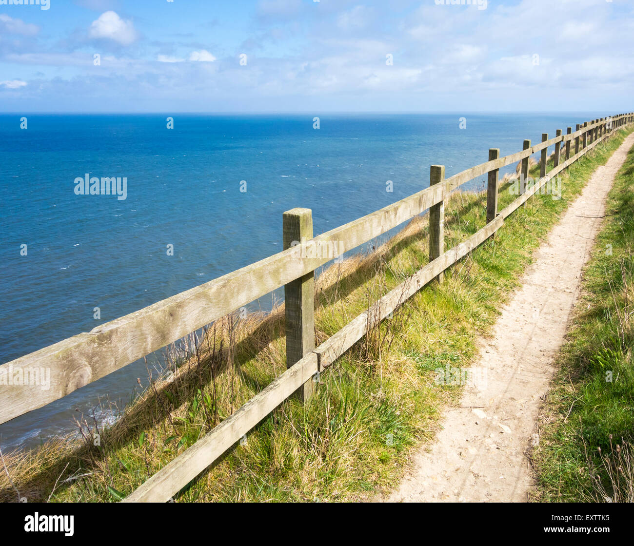 Fence on high cliffs alongside The Cleveland Way National trail ...