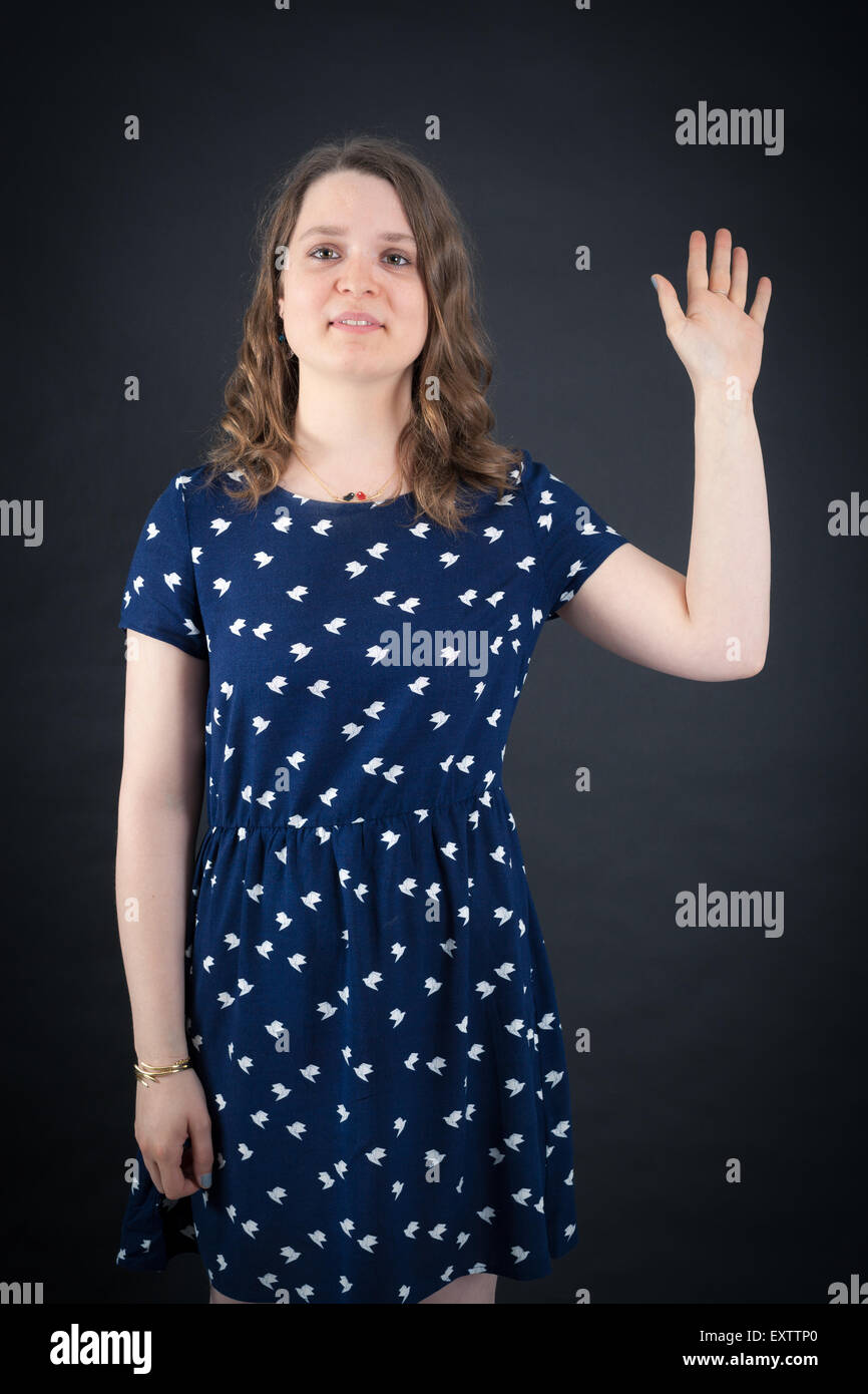 Beautiful woman doing different expressions in different sets of ...