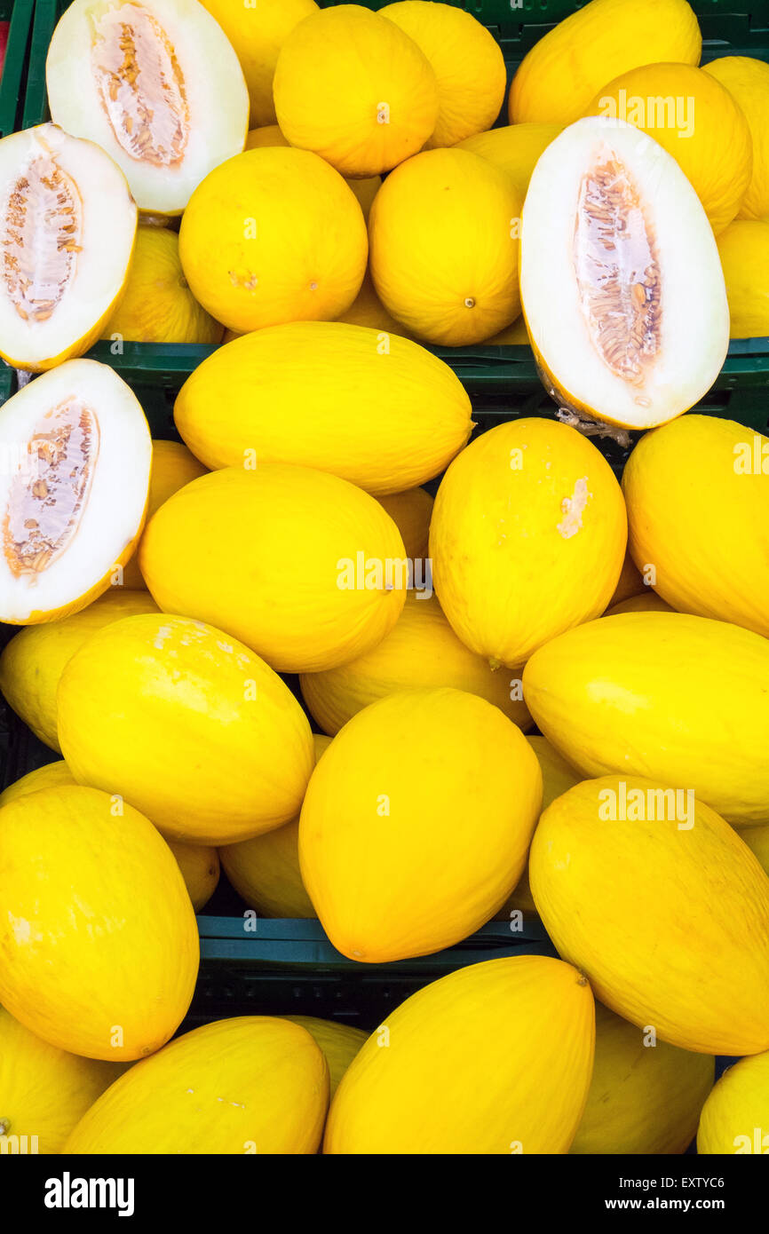 Yellow canary melons for sale at a market Stock Photo - Alamy