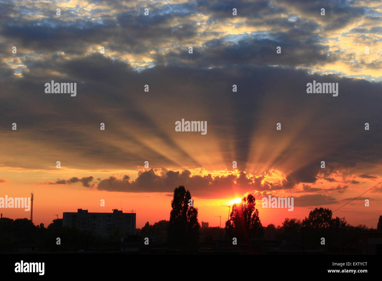 dark summer sunset above the multistory house Stock Photo - Alamy