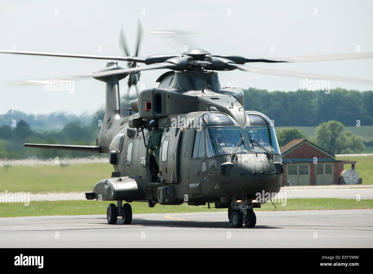 Royal Navy Merlin HC3 helicopter on airfield Stock Photo - Alamy