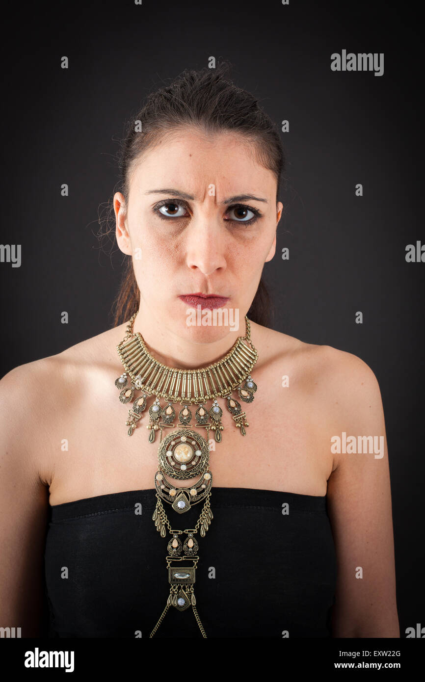 Beautiful woman doing different expressions in different sets of ...