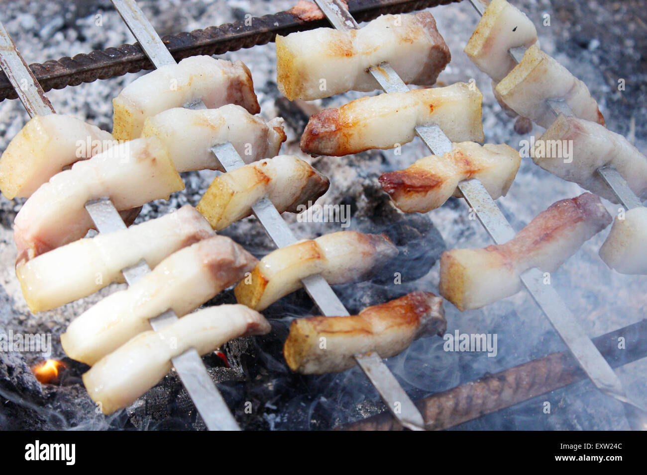 tasty fried pieces of lard cooking on the fire Stock Photo - Alamy