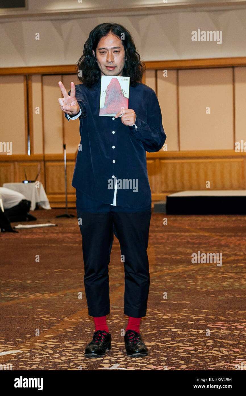 Author Naoki Matayoshi poses for the cameras during the Japanese ...