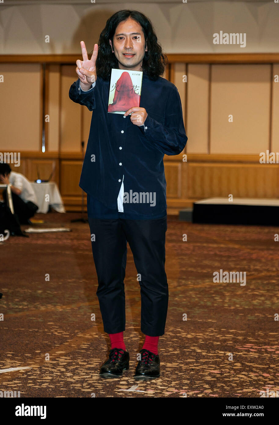 Author Naoki Matayoshi poses for the cameras during the Japanese ...