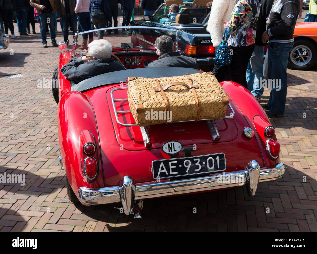 vintage red oldtimer car during the 14th orange tour. This annual tour ...