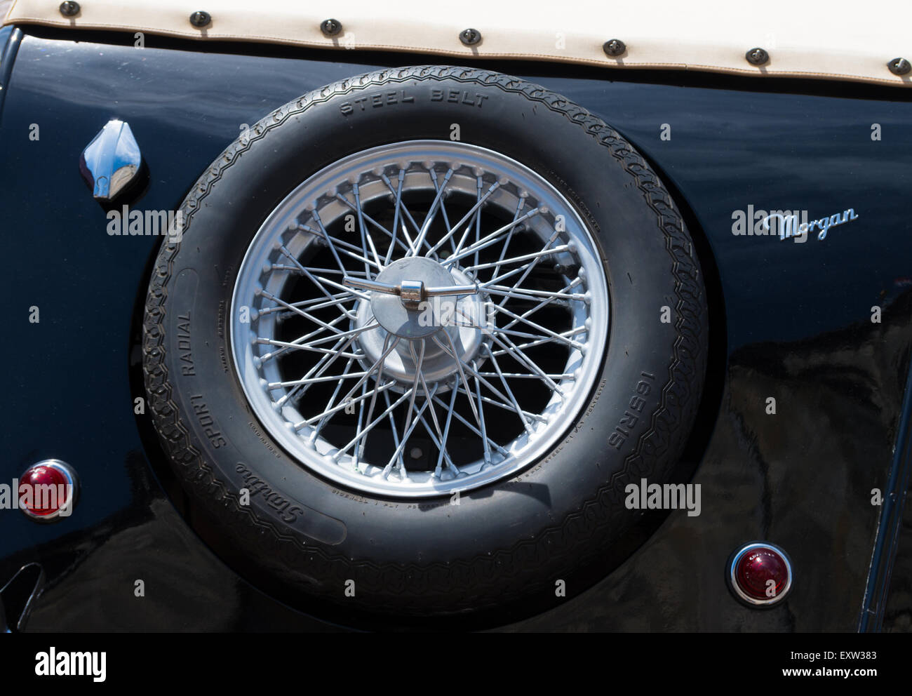 back of a black oldtimer car with spare wheel during the 14th orange ...