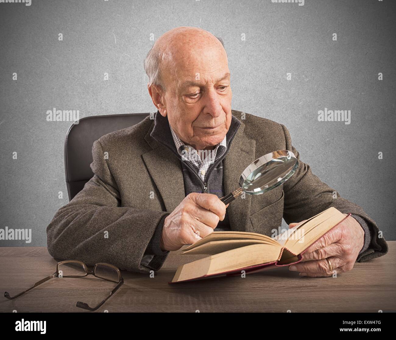 Man analyzing old book hi-res stock photography and images - Alamy