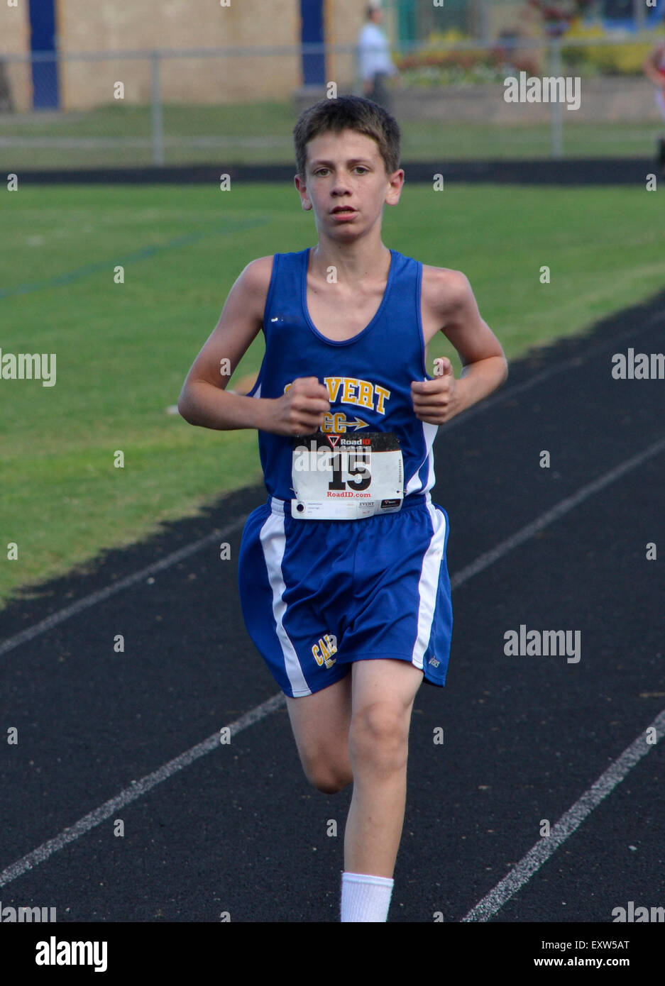 Runner in track meet Stock Photo - Alamy