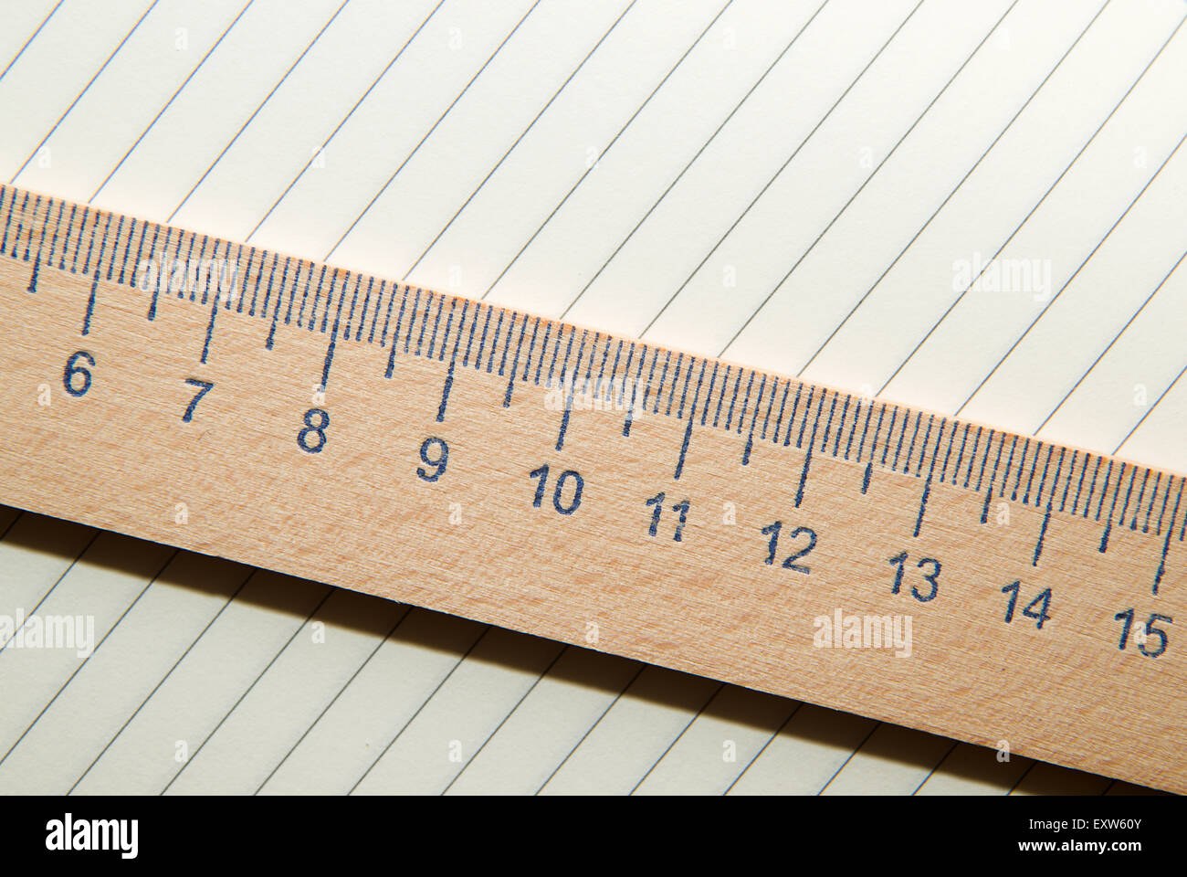 Notepad with a recording sheet and wooden ruler on the old tissue Stock ...