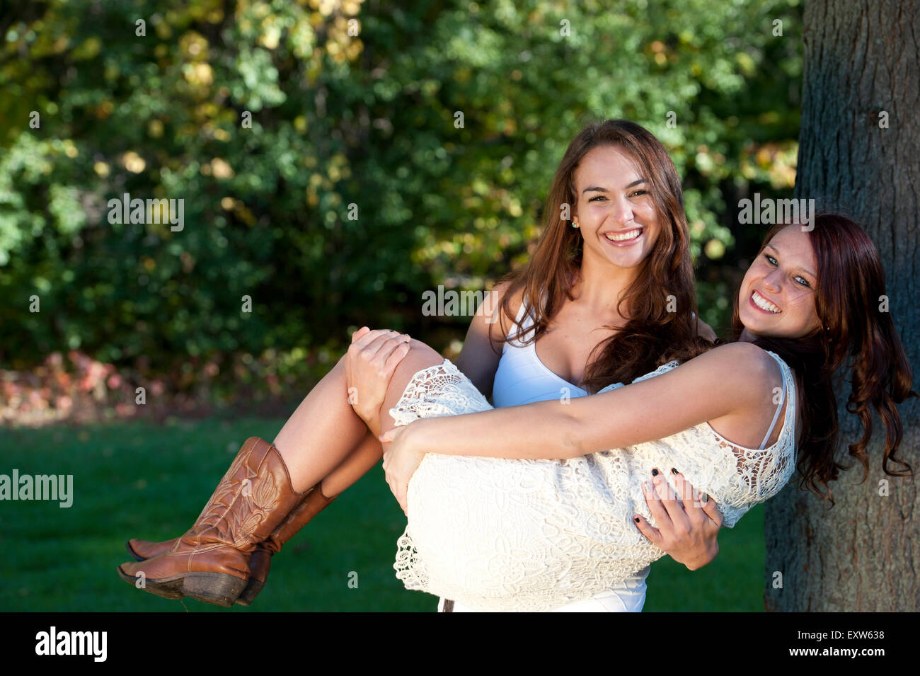 Carrying A Friend Stock Photo - Alamy Carrying A Friend Stock Photo - Alamy